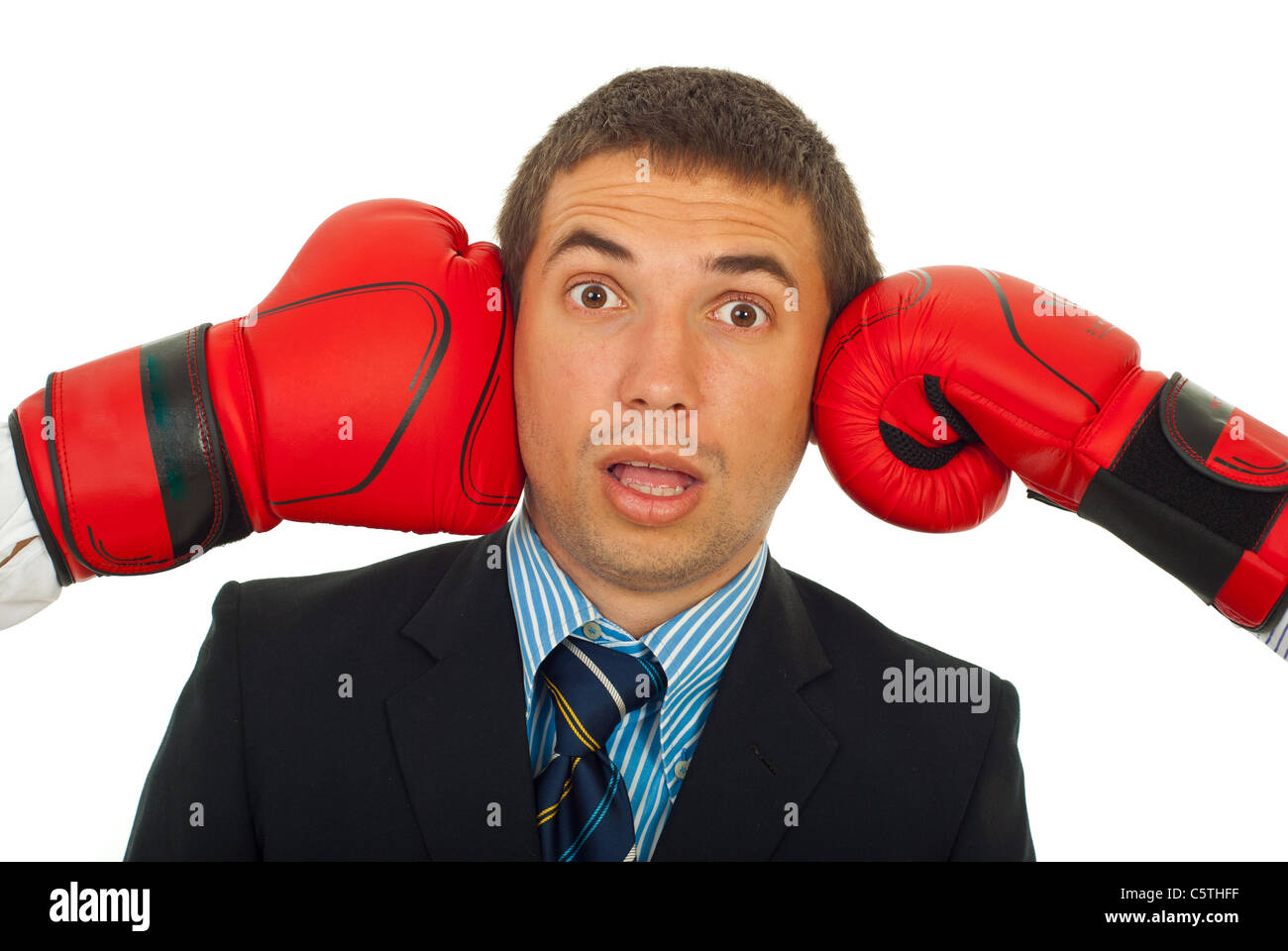 Surprised business man with head under pressure isolated on white ...
