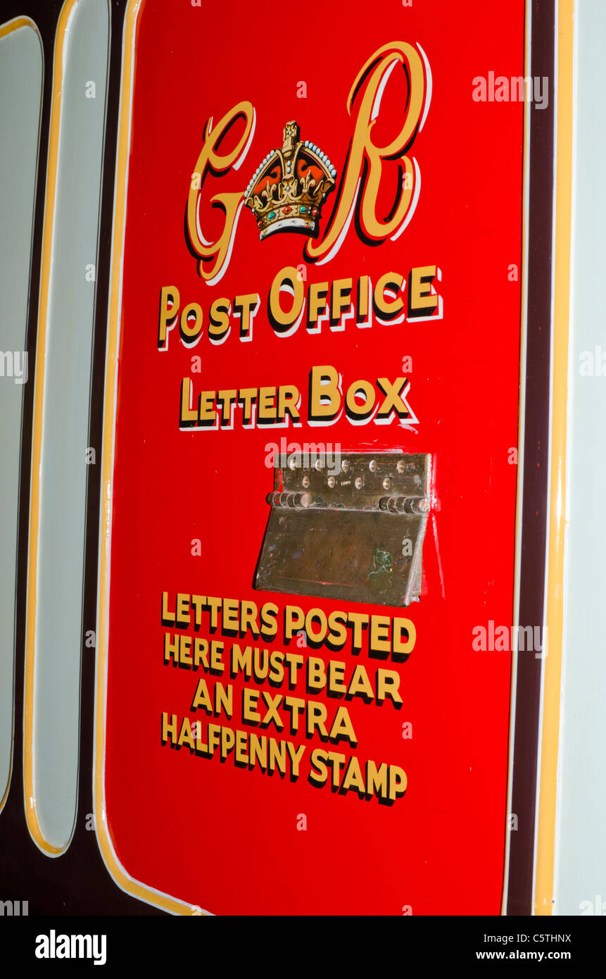 Post Office letter box on the side of an old railway sorting carriage ...