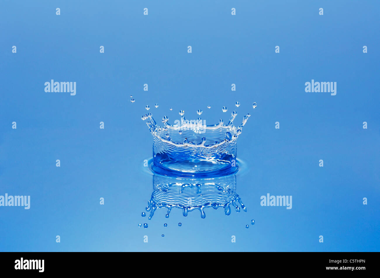 Drop of water splashing, close up Stock Photo - Alamy