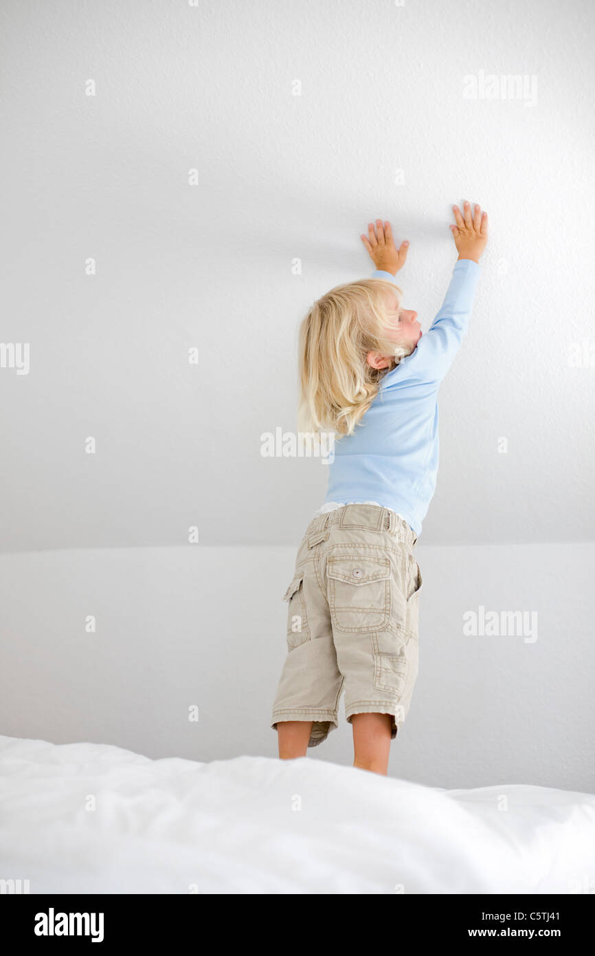 Person touching wall hi-res stock photography and images - Alamy
