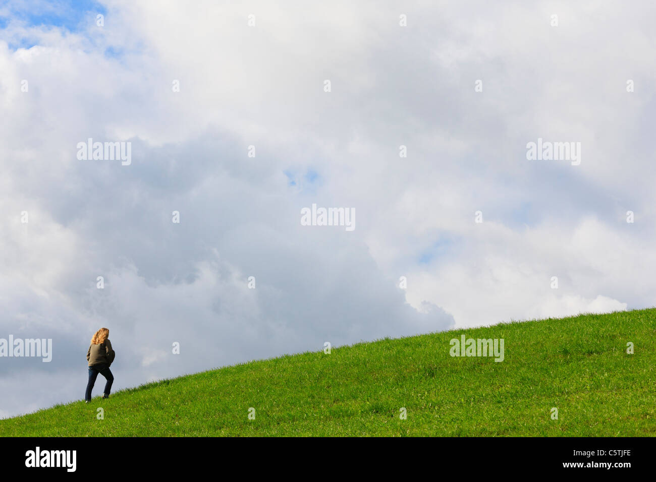 Walking on slope hi-res stock photography and images - Alamy