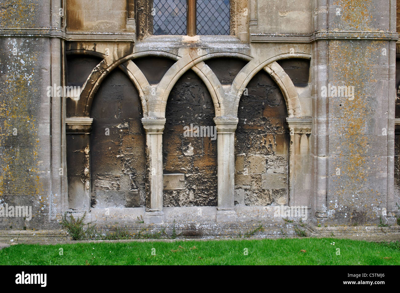 Arcading on exterior of Malmesbury Abbey, Wiltshire, England, UK Stock ...