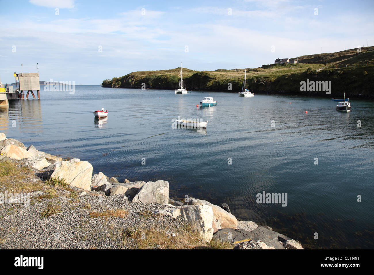 Sea end of the Harbour photographed in the evening in Tarbert, Harris ...