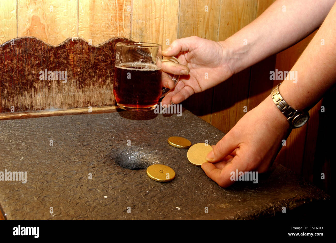 The traditional pub game of "toad in the hole" at the Lewes Arms in ...