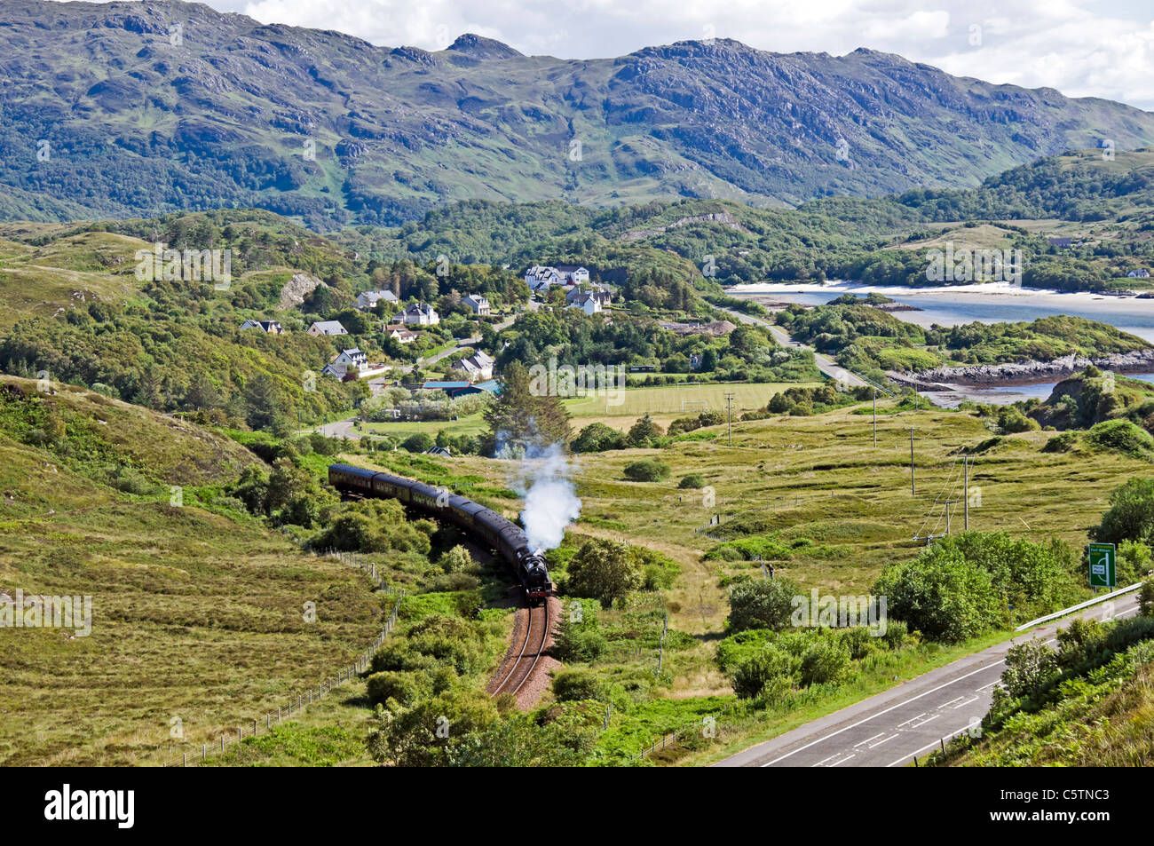The afternoon Jacobite steam train leaving Morar in the west highlands ...
