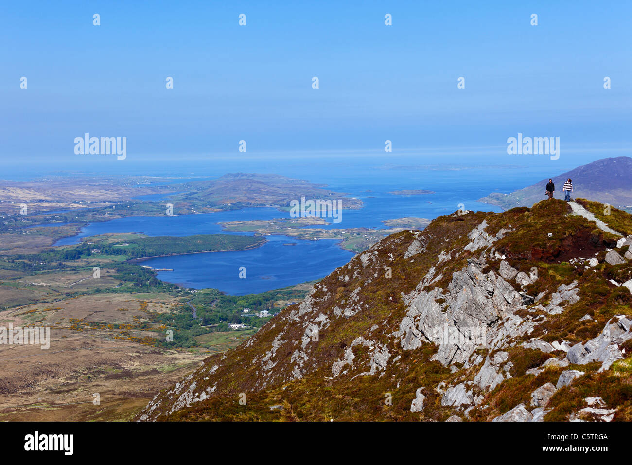 Ireland, County Galway, Connemara, People at ballinakill harbour Stock ...