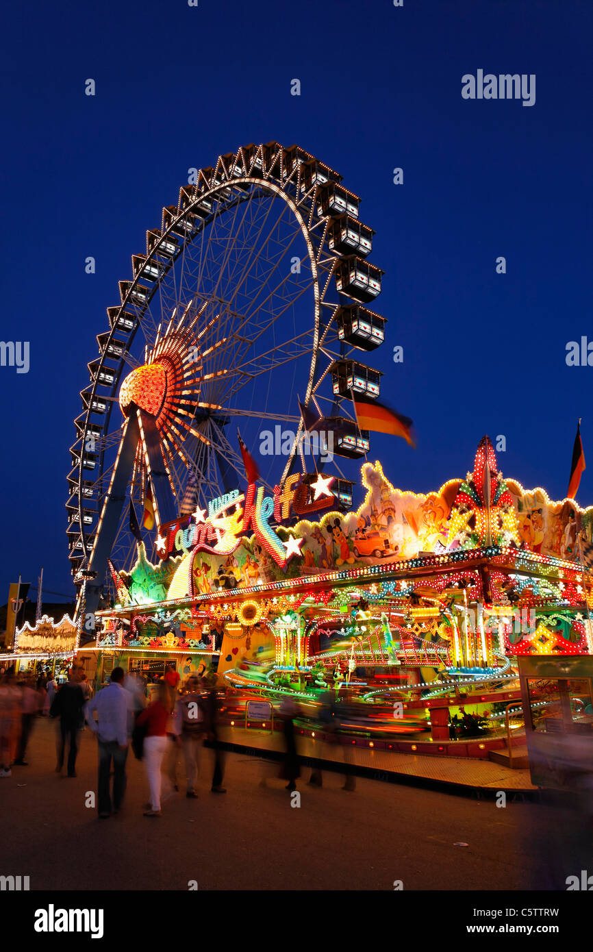 People celebrating oktoberfest at night hi-res stock photography and ...