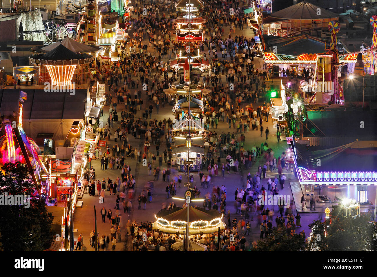 People celebrating oktoberfest at night hi-res stock photography and ...