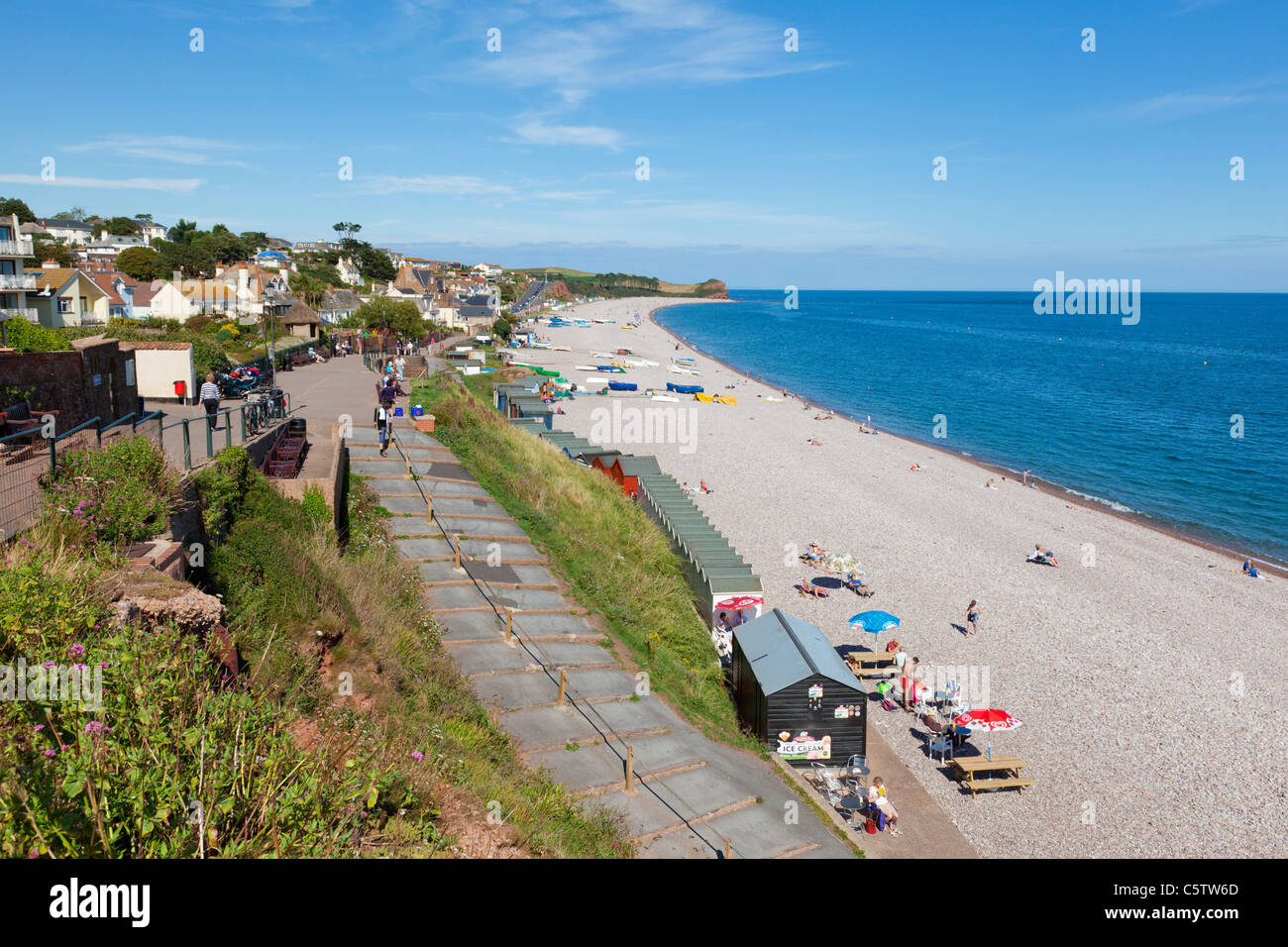 Pebble beach and bathing huts at Budleigh Salterton beach Devon England ...