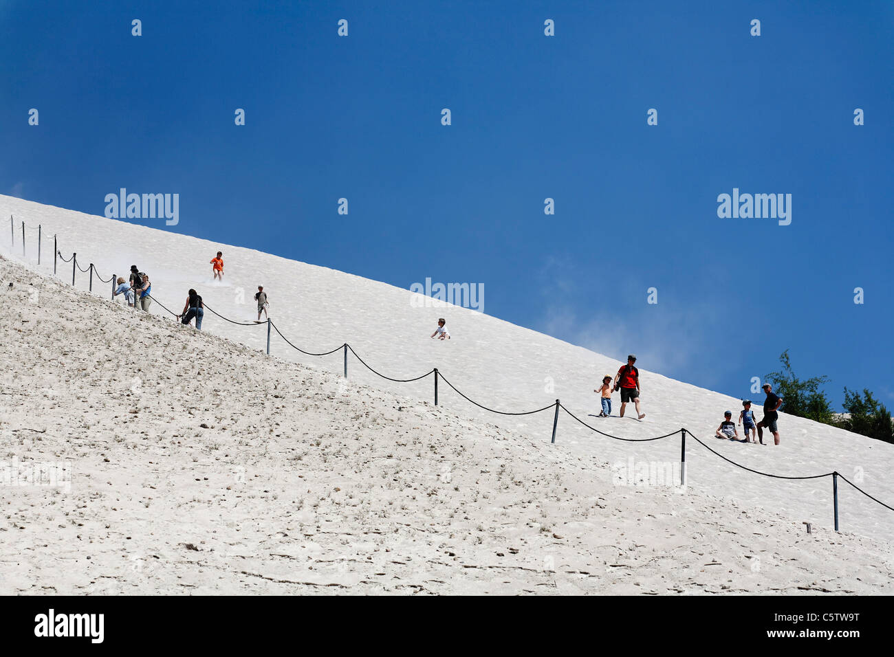 Germany, Bavaria, Upper Palatinate, Hirschau, People doing sand skiing ...