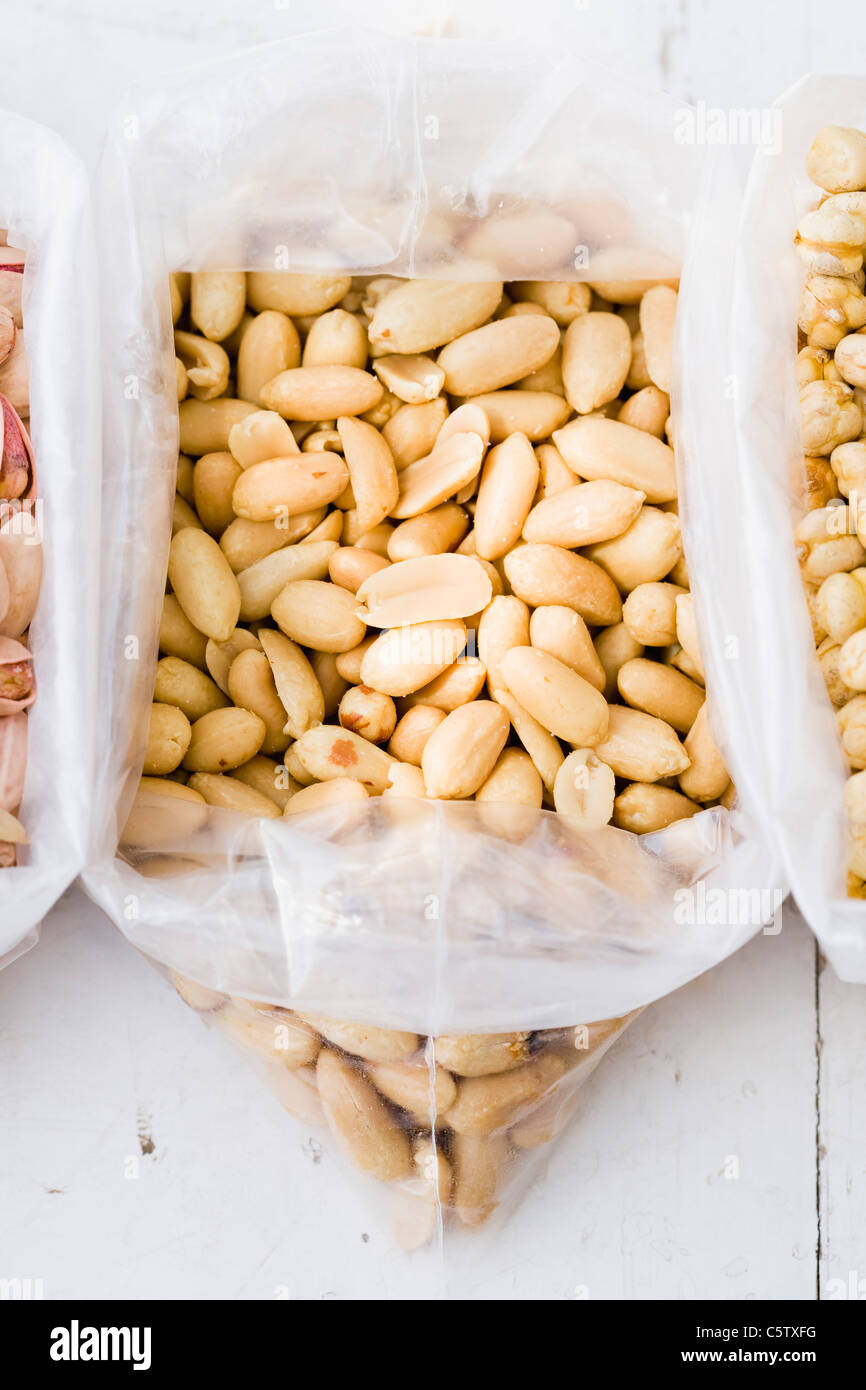 Peanuts in plastic bag, elevated view Stock Photo - Alamy