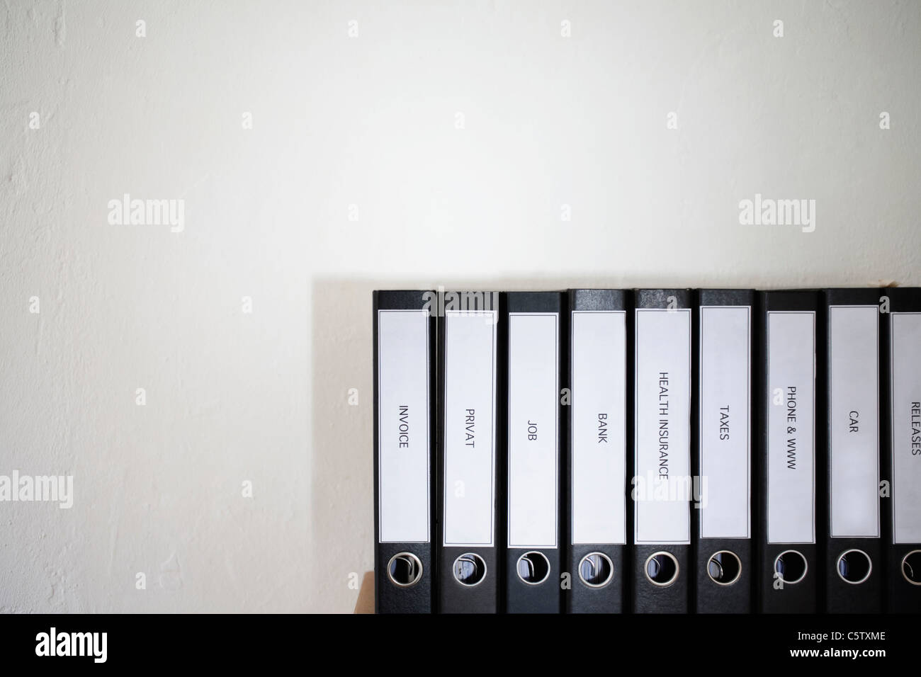 Folders in a row Stock Photo - Alamy