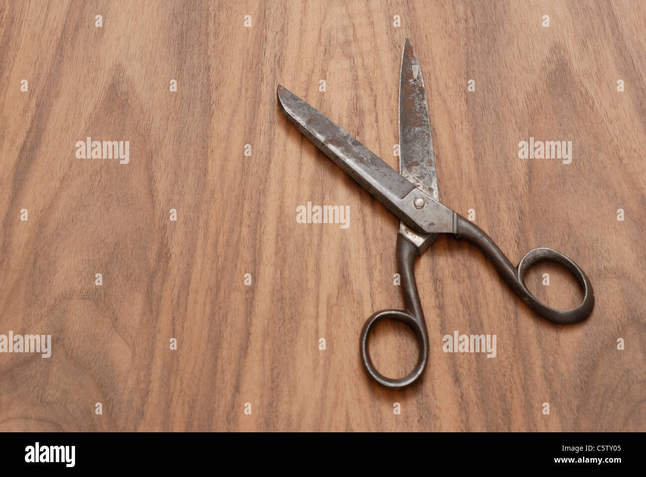Old Scissors on wooden table, elevated view Stock Photo - Alamy