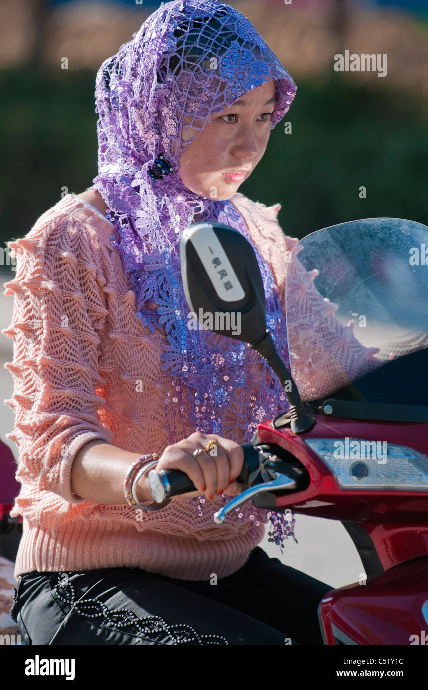 Motorcycle woman muslim transport hi-res stock photography and images ...