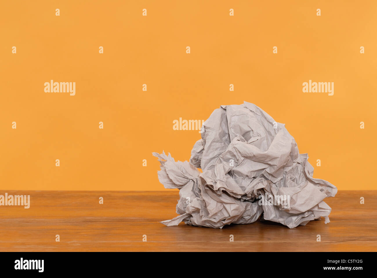 Crumpled ball of paper, close up Stock Photo - Alamy