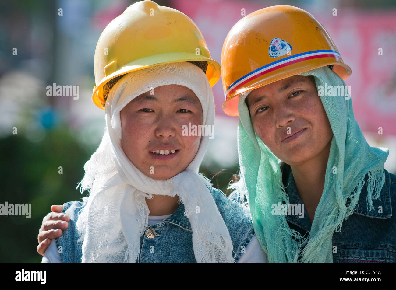 Women laborers take break from digging ditch, Dulan, Qinghai Province ...