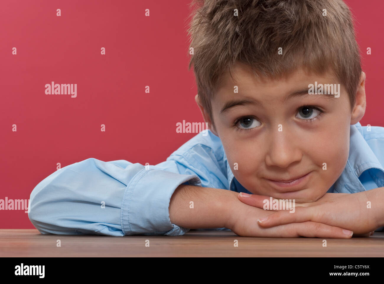 Boy student leaning head hi-res stock photography and images - Alamy