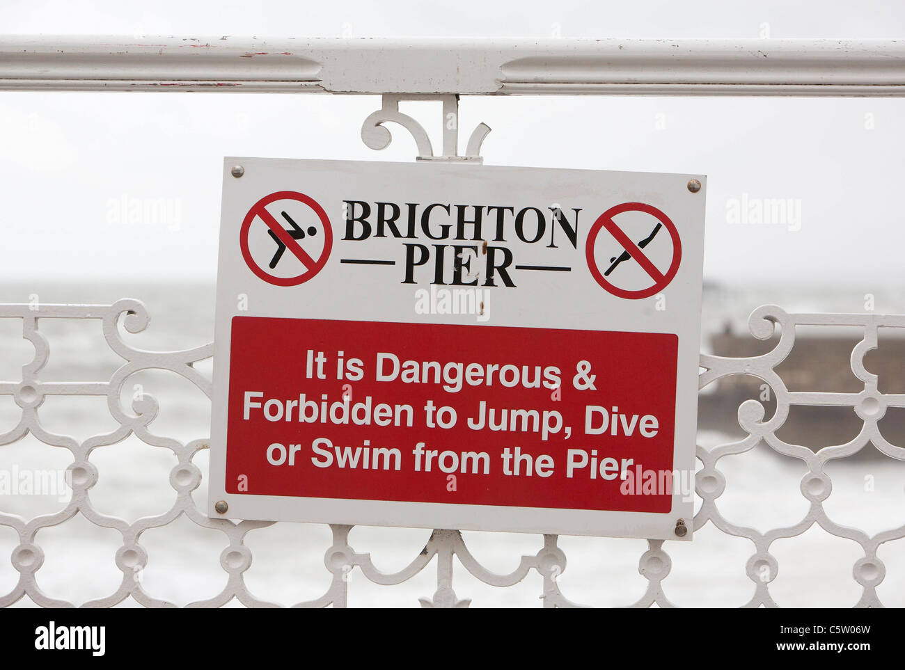 Warning sign on Brighton Pier. Picture by James Boardman Stock Photo ...