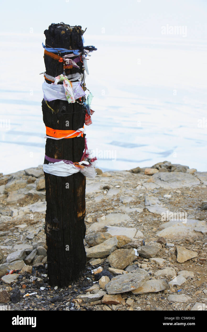Russia, Olchon Island, Lake Baikal, Wooden post, sacrificial site ...
