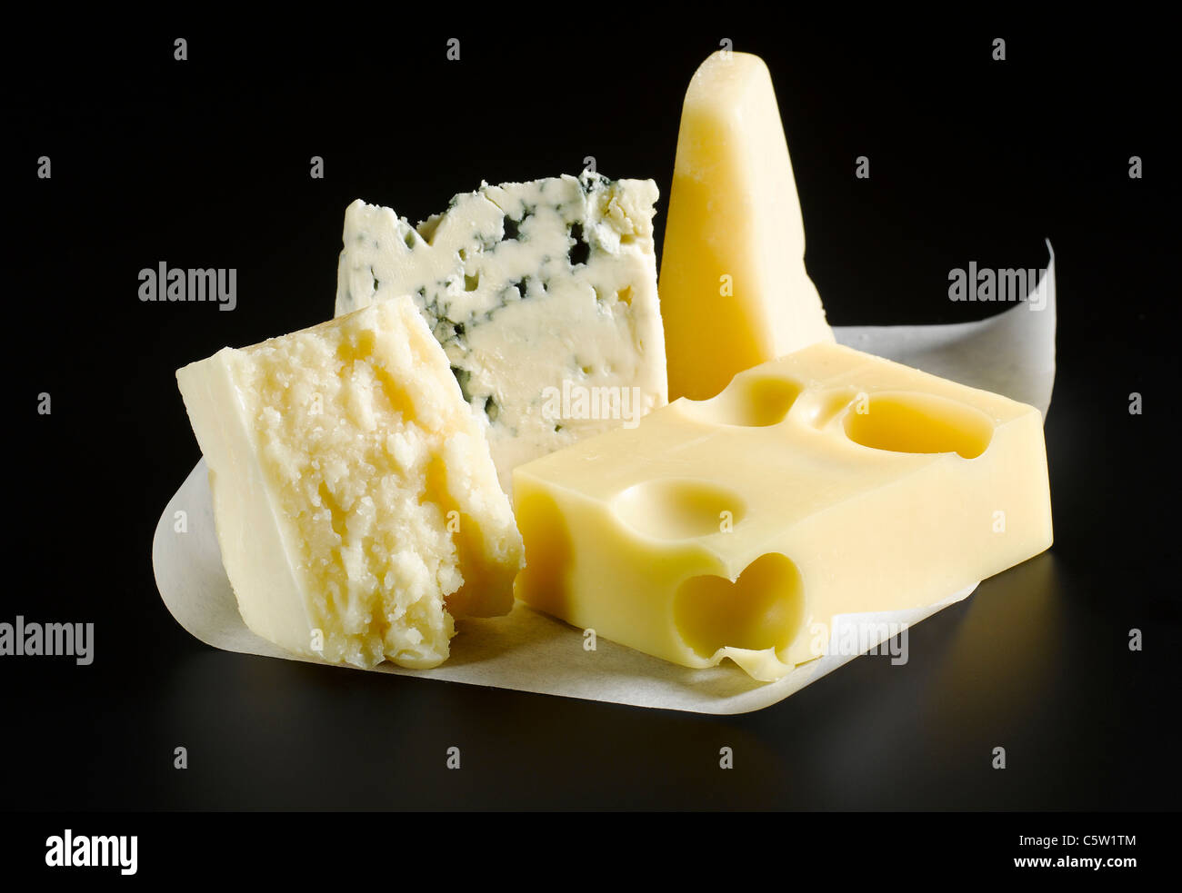 Pieces of cheese Stock Photo - Alamy