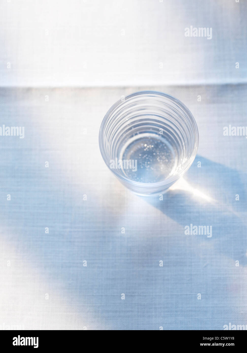 Glass of water, elevated view Stock Photo - Alamy