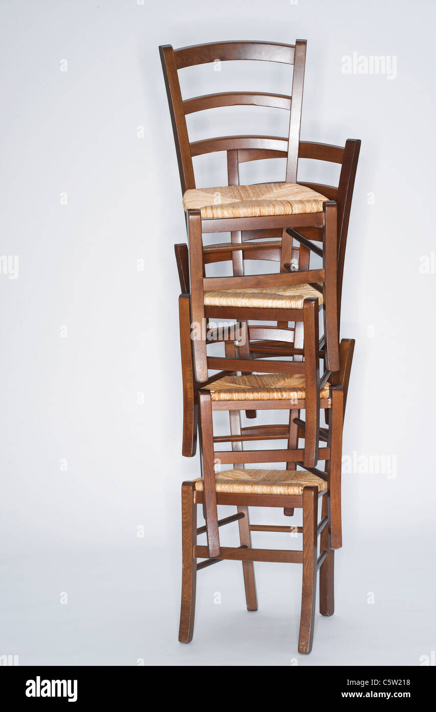 Stack of chairs, close-up Stock Photo - Alamy
