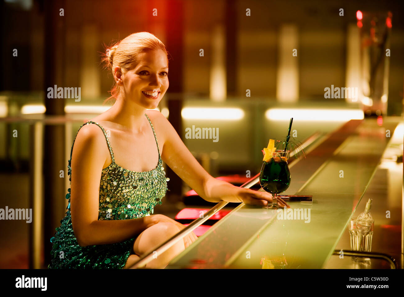 Woman in evening dress cocktail hi-res stock photography and images - Alamy