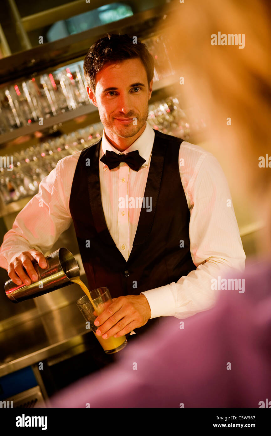 Barkeeper preparing a cocktail Stock Photo - Alamy