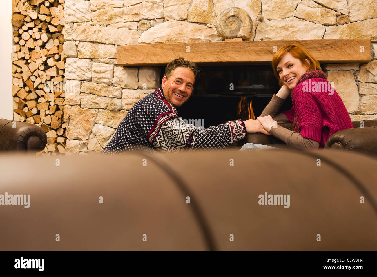 Sitting by the fireside hi-res stock photography and images - Alamy