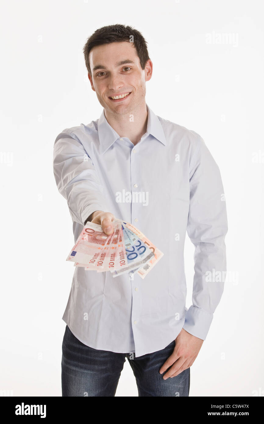 Human hand holding 10 euro note hi-res stock photography and images - Alamy