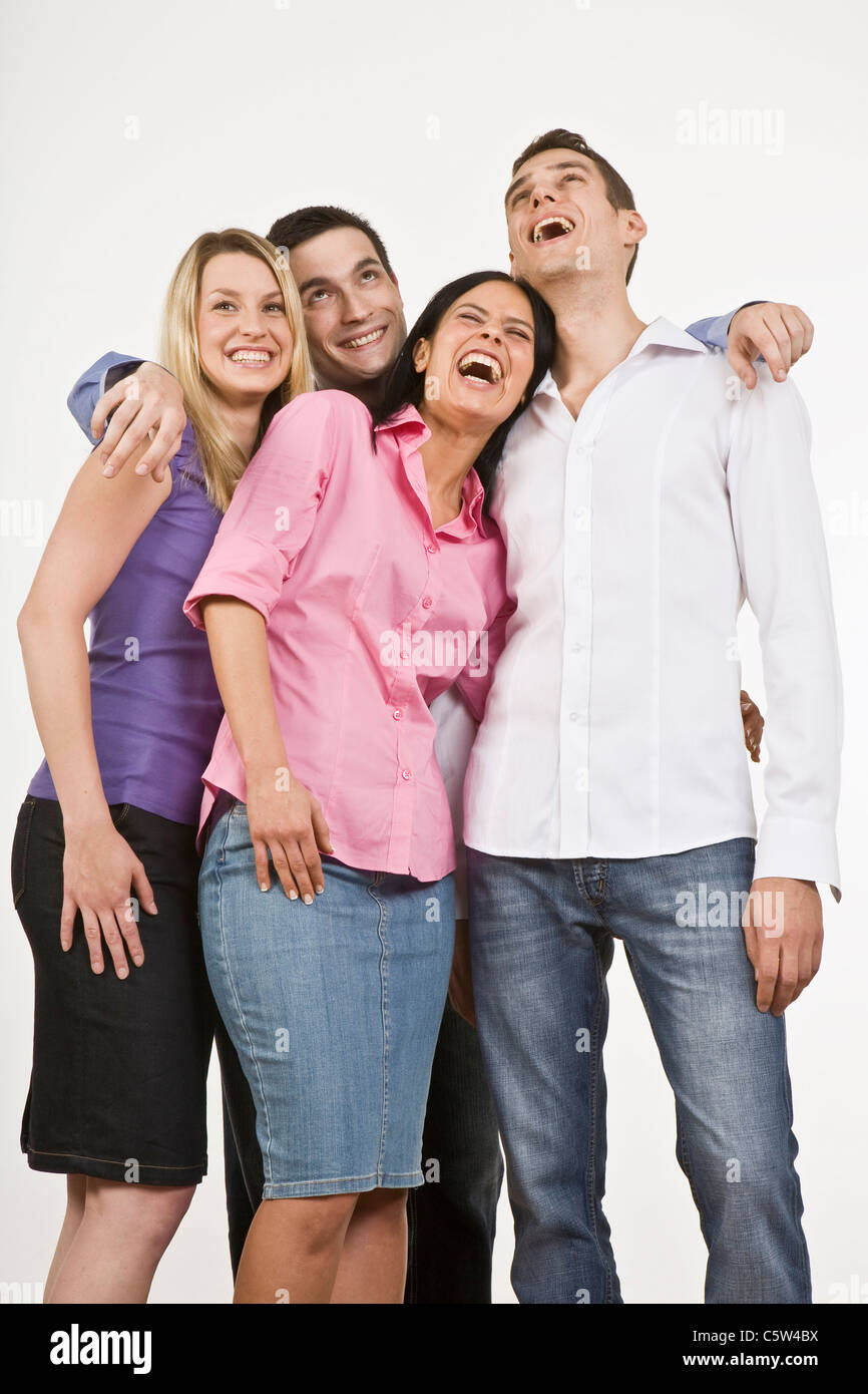 Group of people, embracing, laughing, portrait Stock Photo - Alamy
