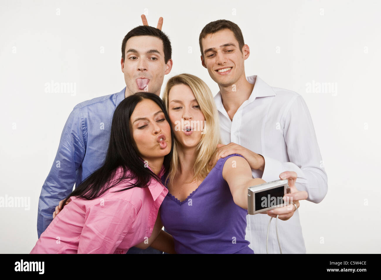 Group of people using digital camera, portrait Stock Photo - Alamy