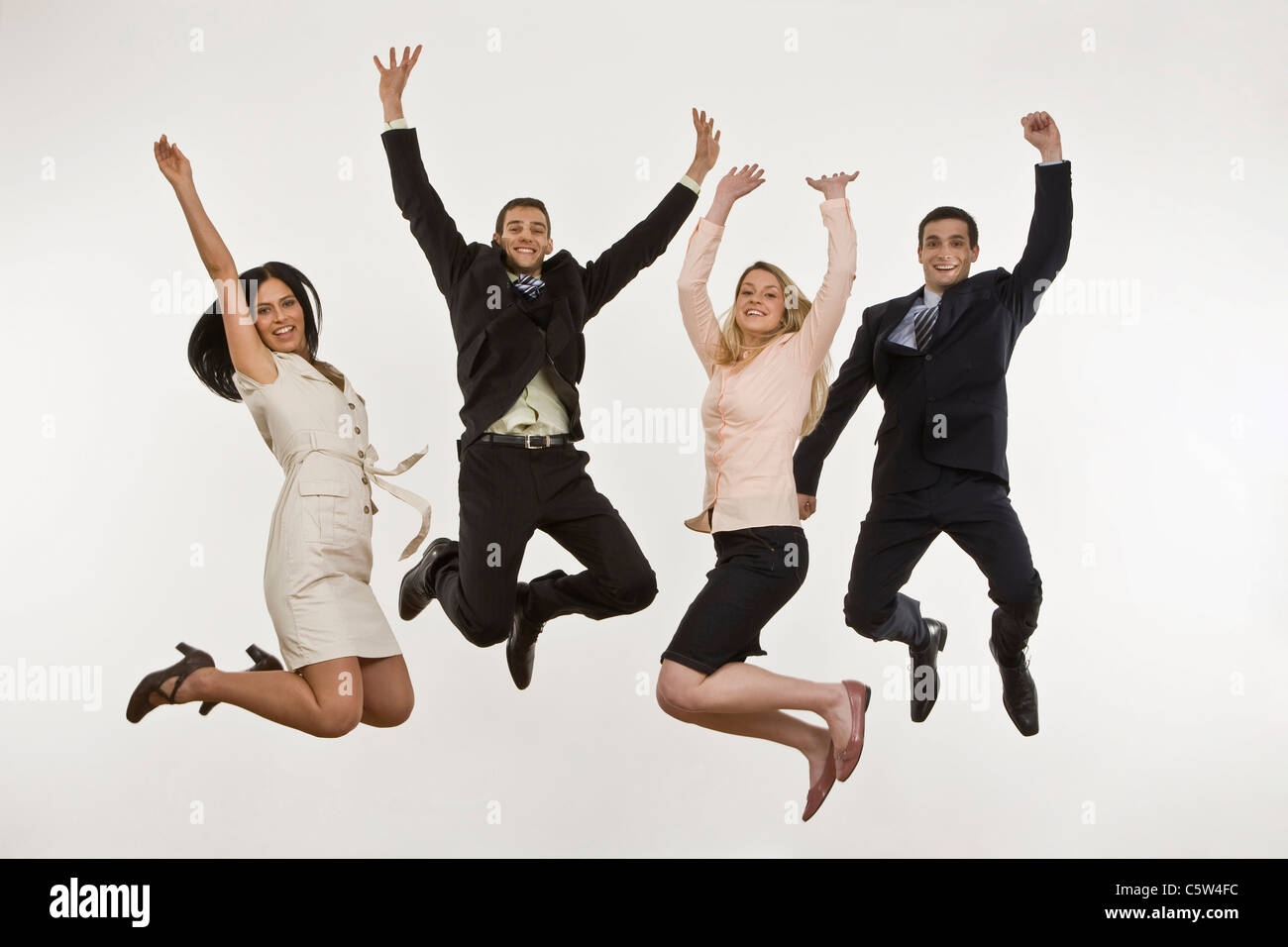 Happy People Jumping In The Air