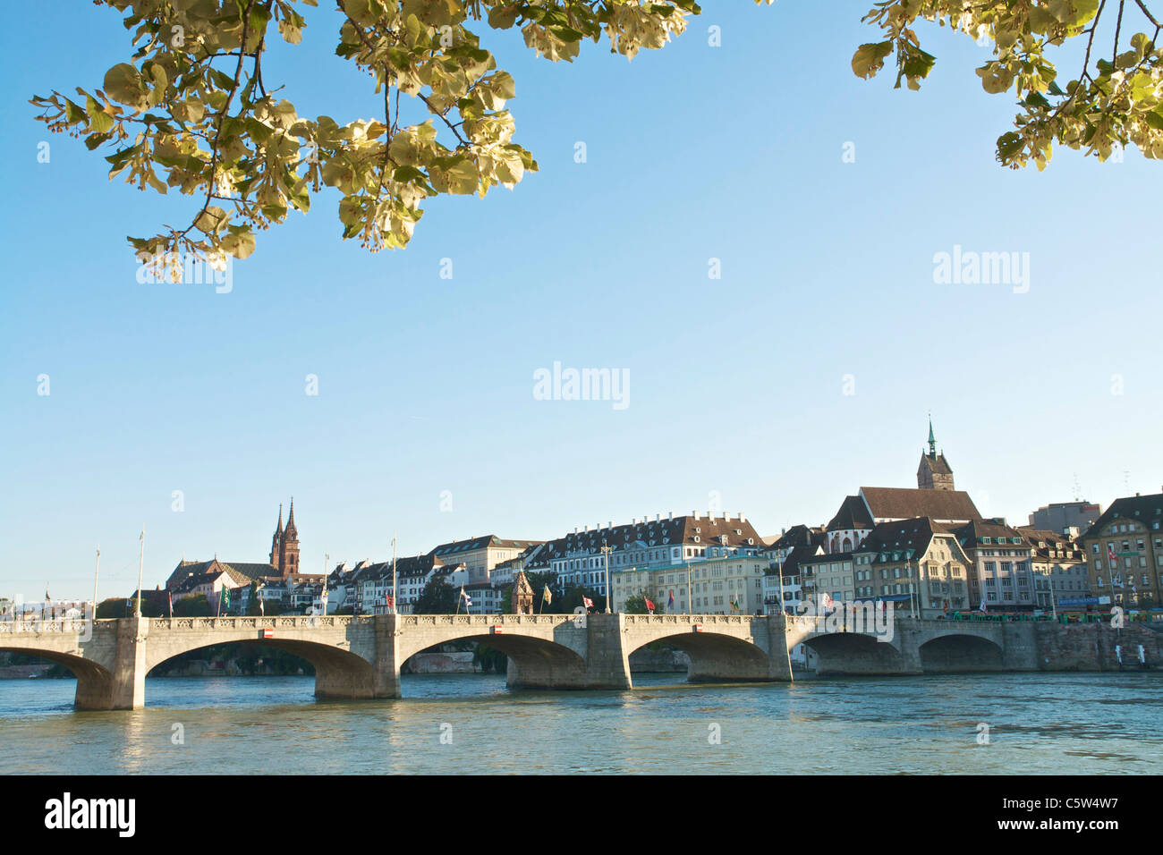 Switzerland, Basel, bridge over Rhine river with Basel Cathedral in ...