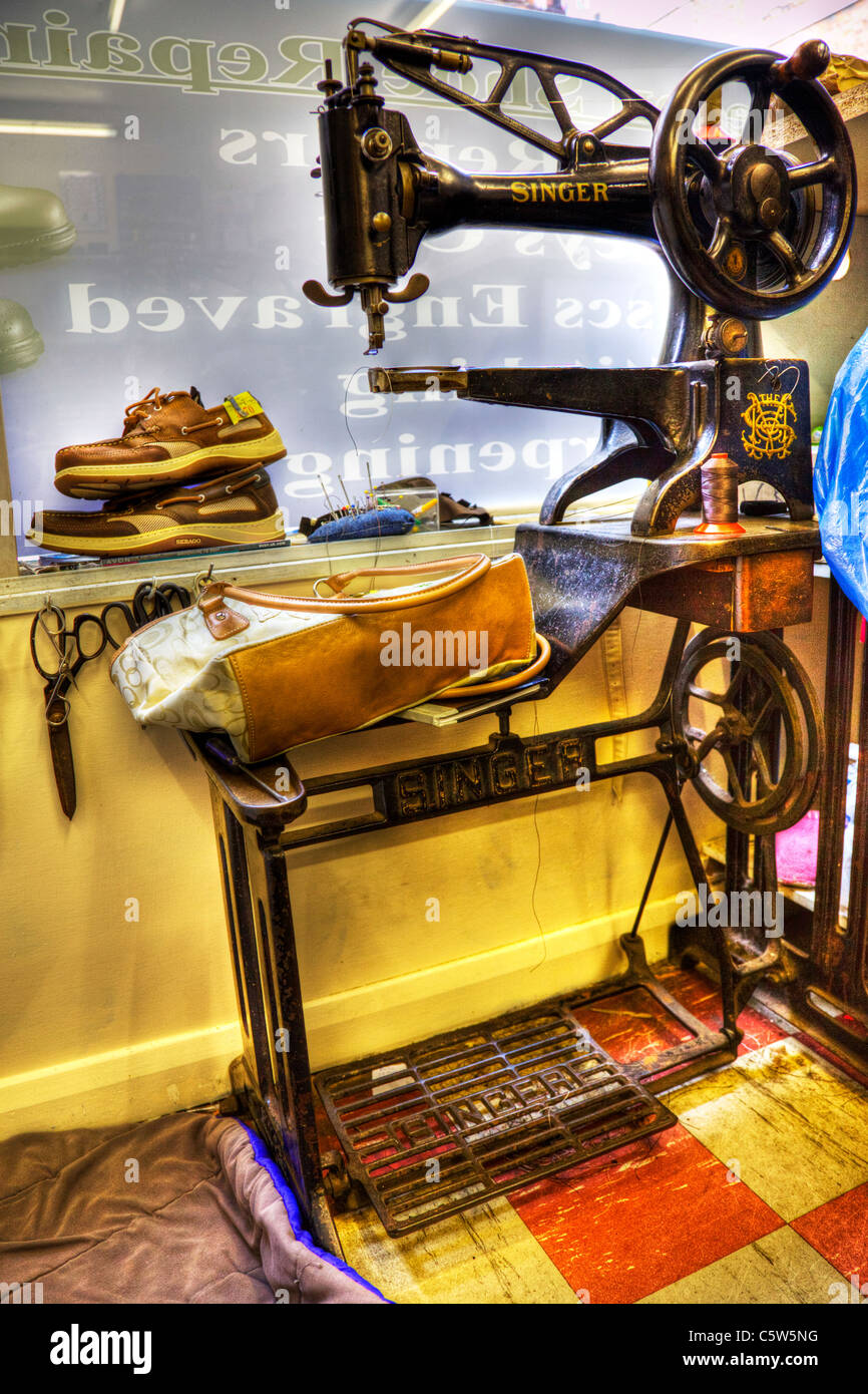 HDR image of a singer sewing machine in a cobblers shop with work ...