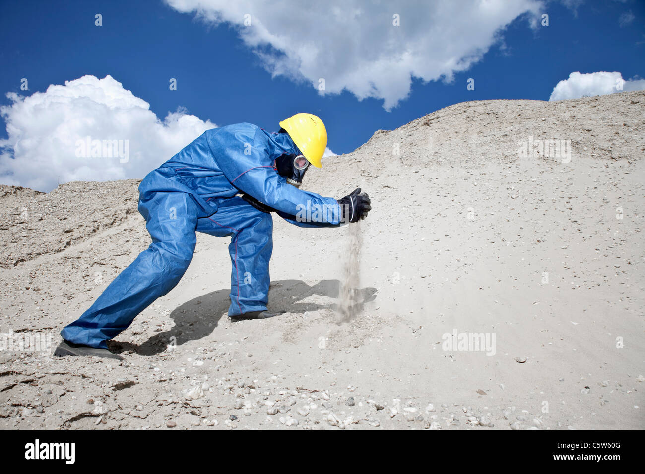 Man hands holding spilling sand hi-res stock photography and images - Alamy