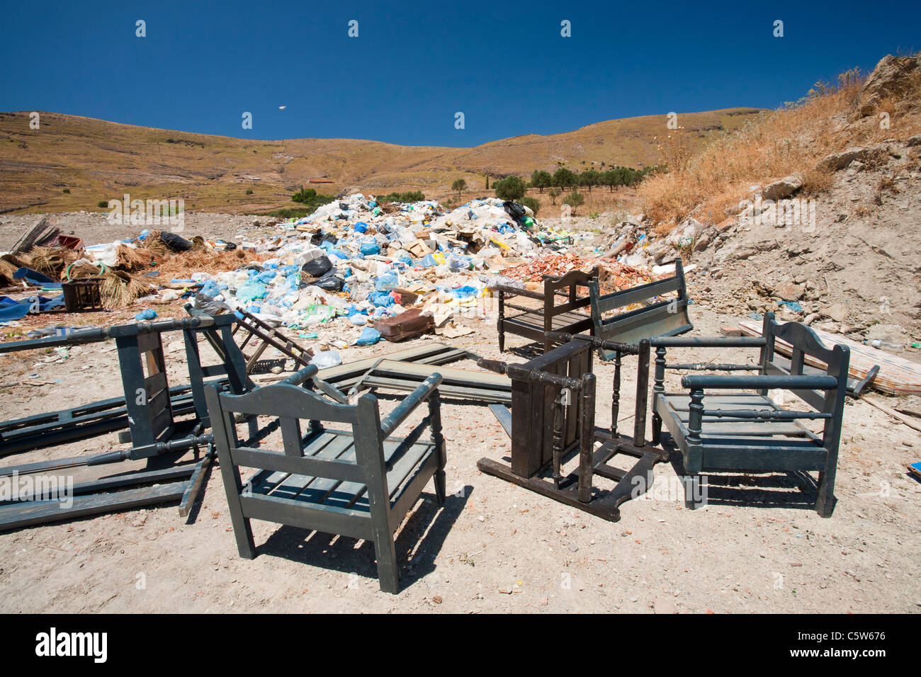 Chair in a landfill hi-res stock photography and images - Alamy