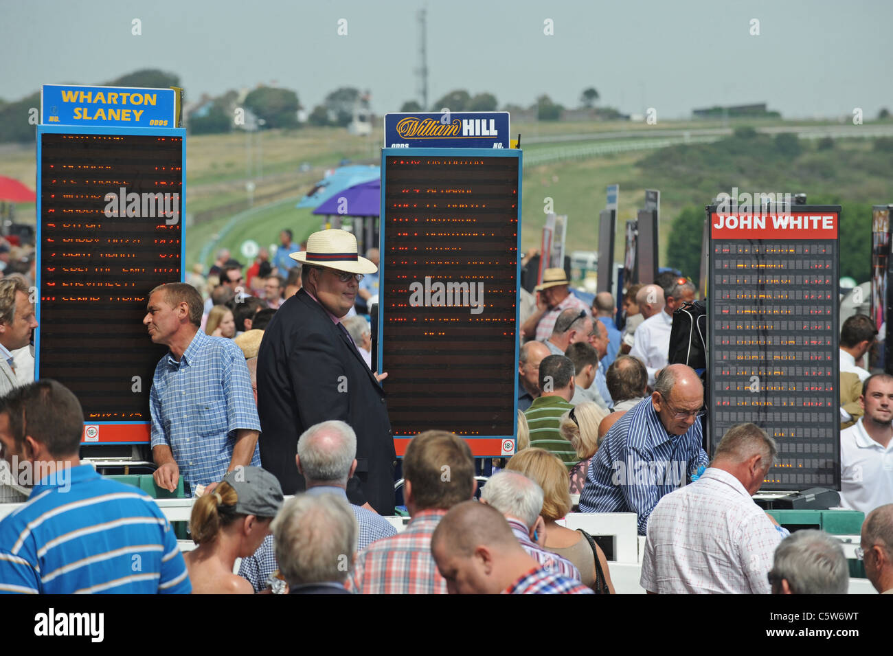 A packed crowd on the first day of the Brighton Races Festival today 3 ...
