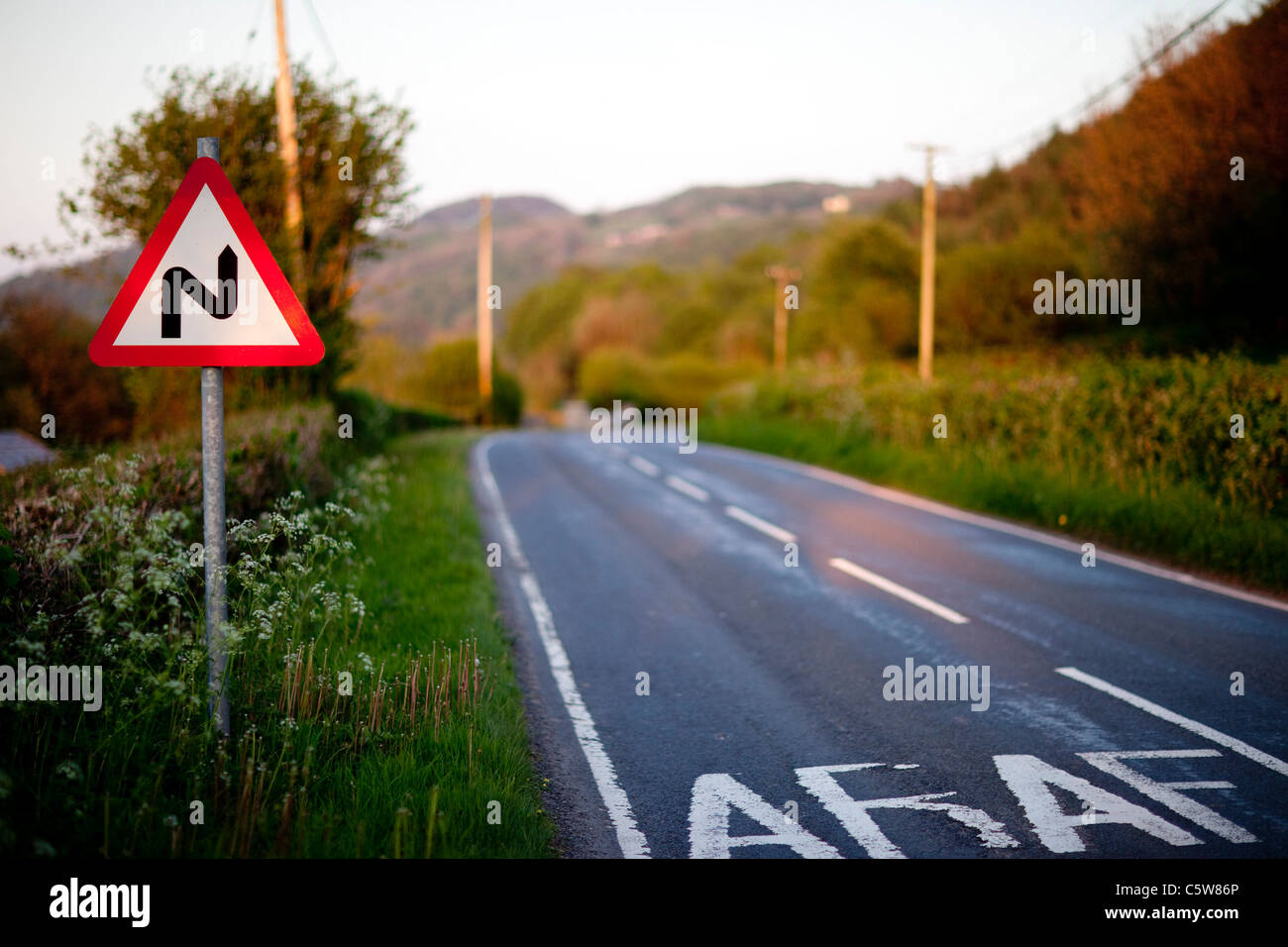 Black And White Road Bend Sign High Resolution Stock Photography and ...