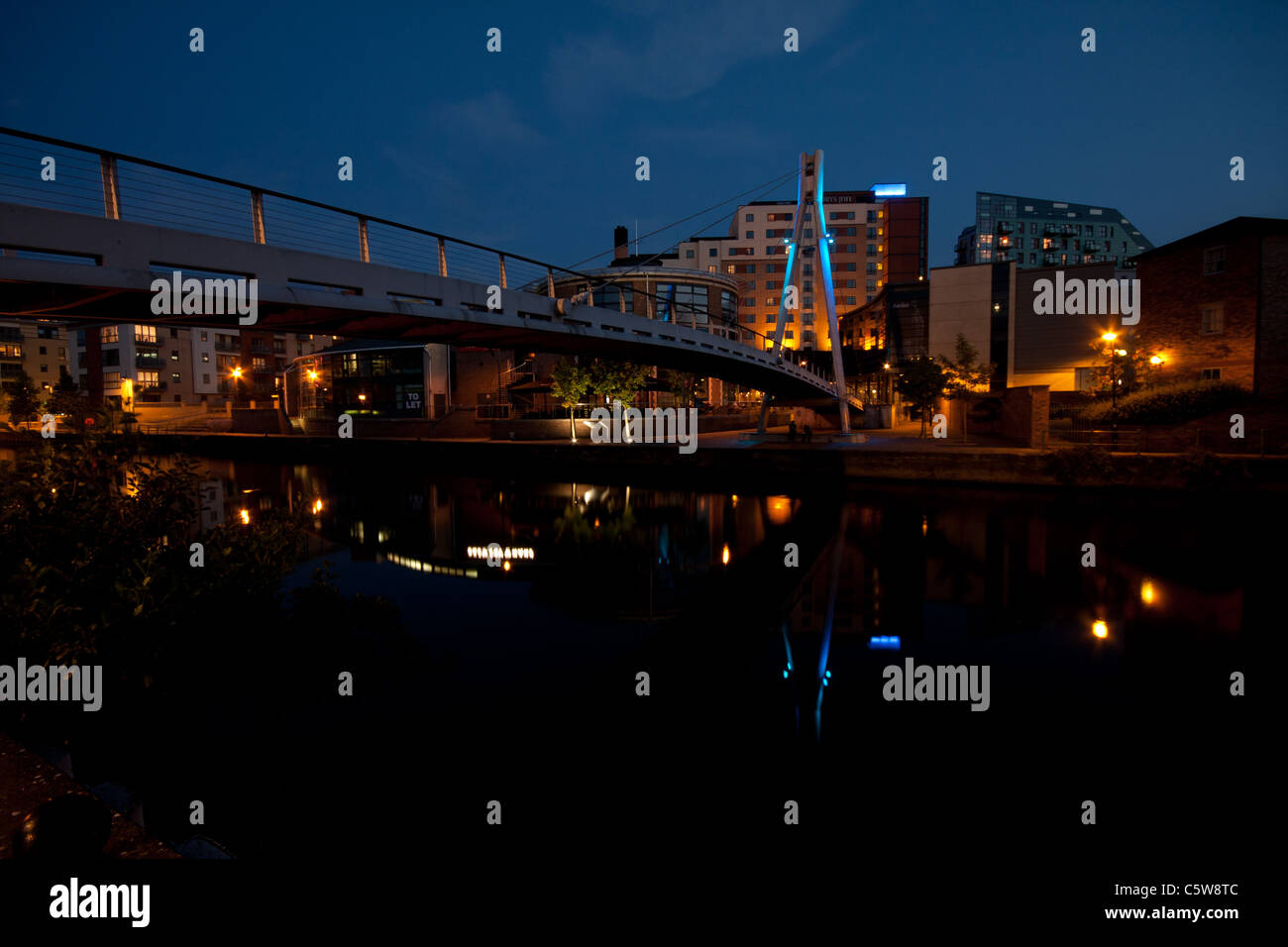 A pedestrian bridge over the Leeds and Liverpool Canal in Leeds City ...