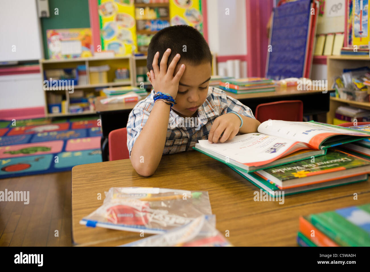 First grade Caucasian boy in classroom Stock Photo - Alamy