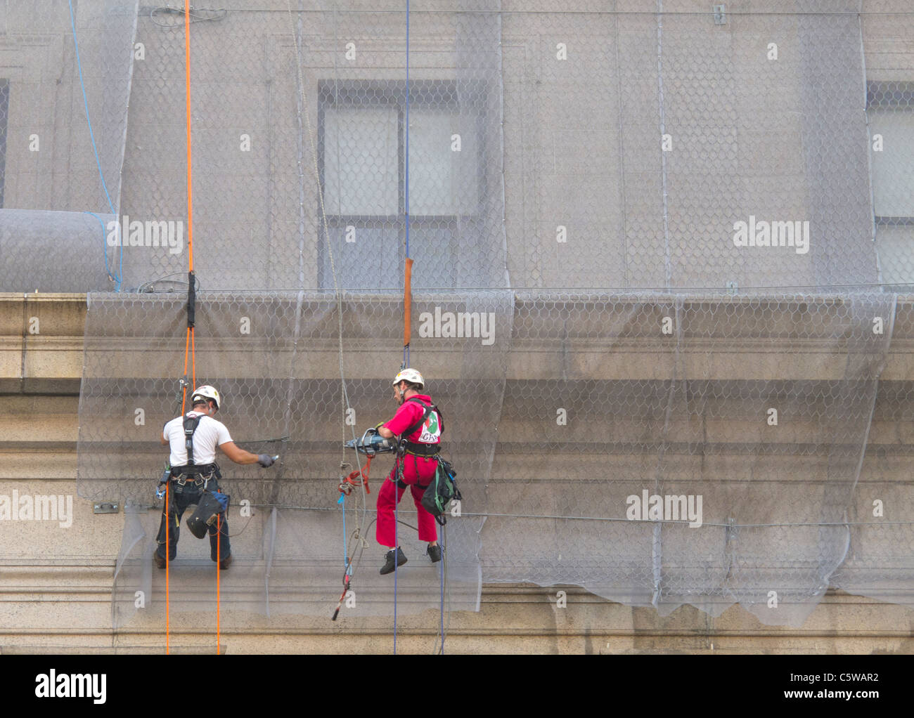 Repelling men hi-res stock photography and images - Alamy