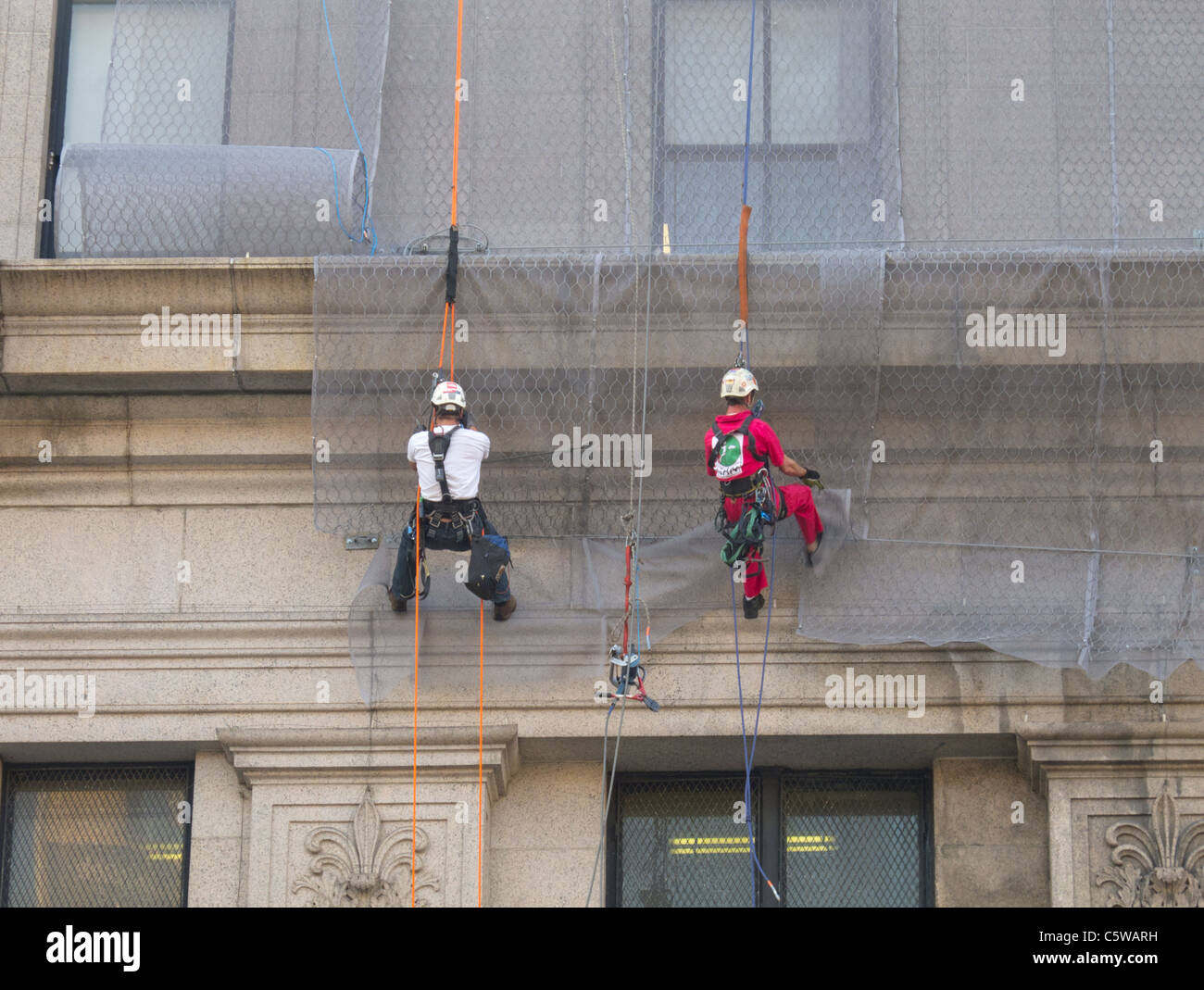 Repelling men hi-res stock photography and images - Alamy