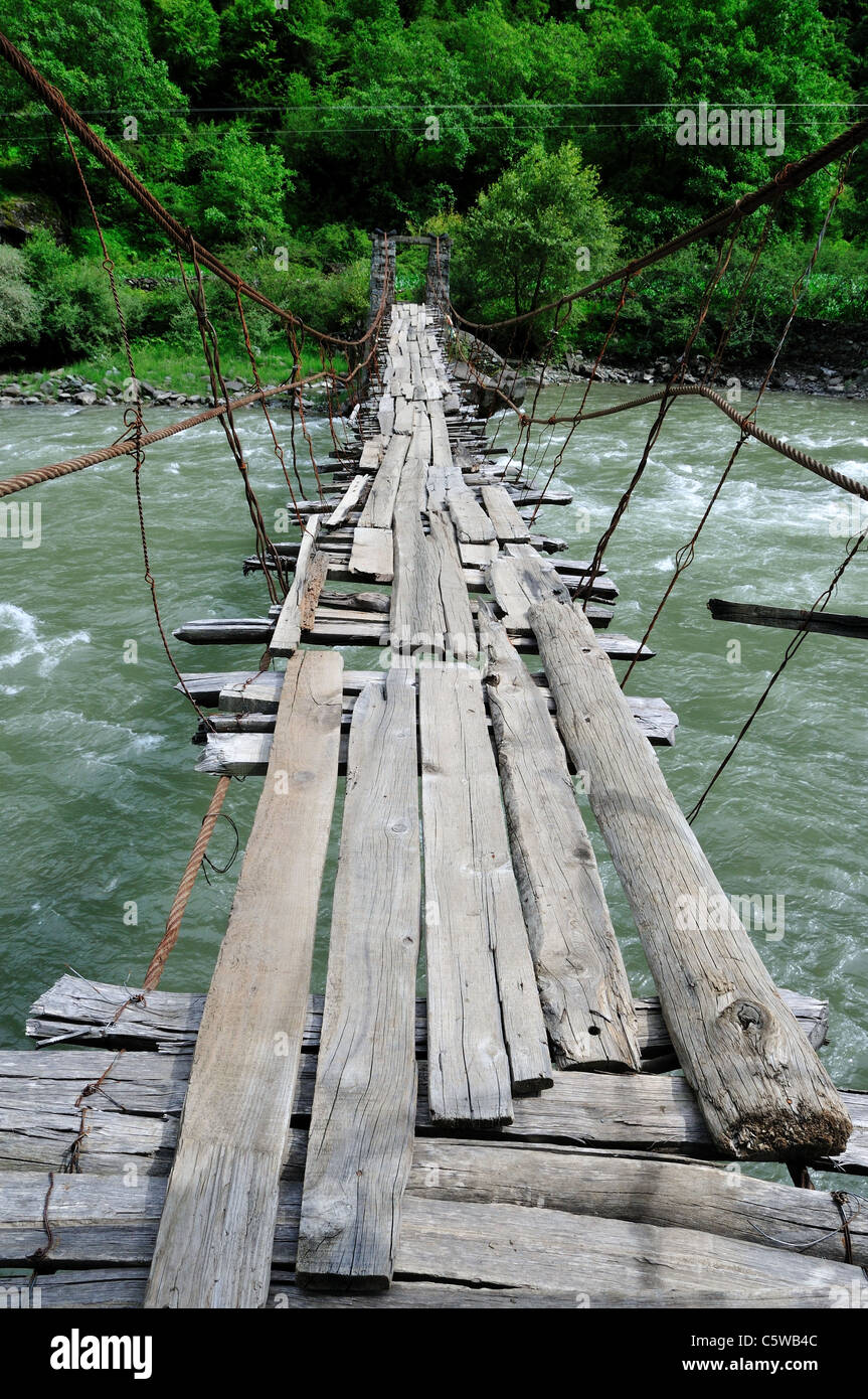 A hanging bridge over treacherous river. Sichuan, China Stock Photo - Alamy
