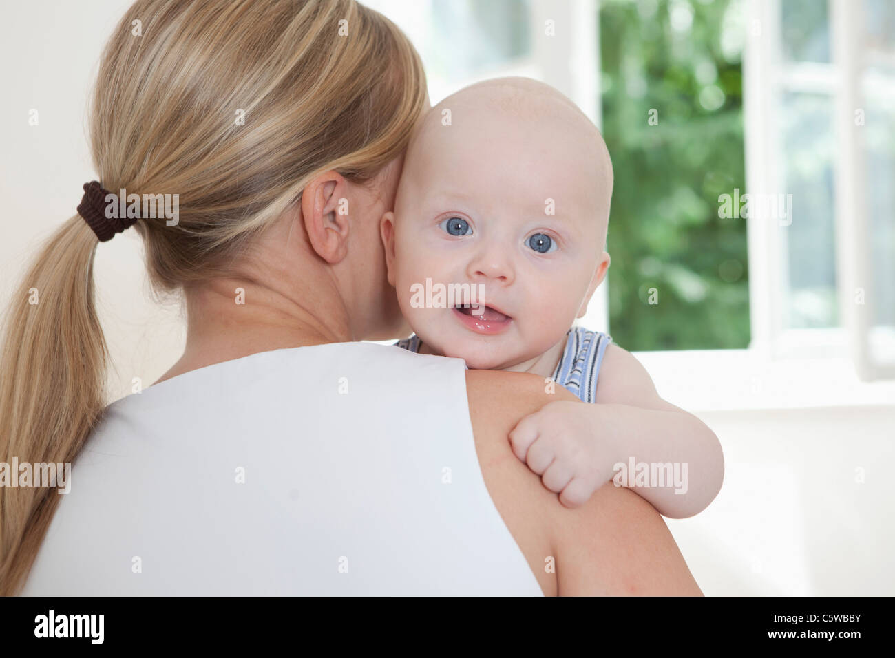 Germany, Munich, Mother with (2-5 months) baby boy Stock Photo - Alamy
