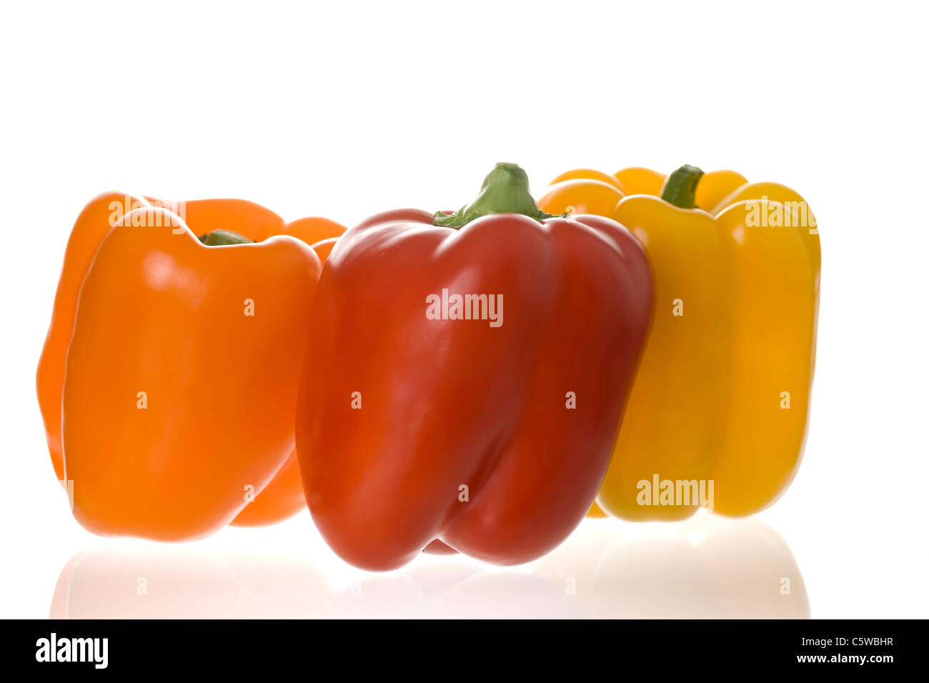 Healthy food samples of three fresh peppers red yellow and orange Stock ...