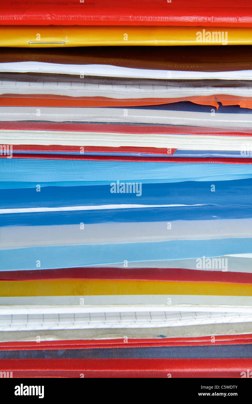 Germany, Stack of colourful school homework note books, close up Stock ...
