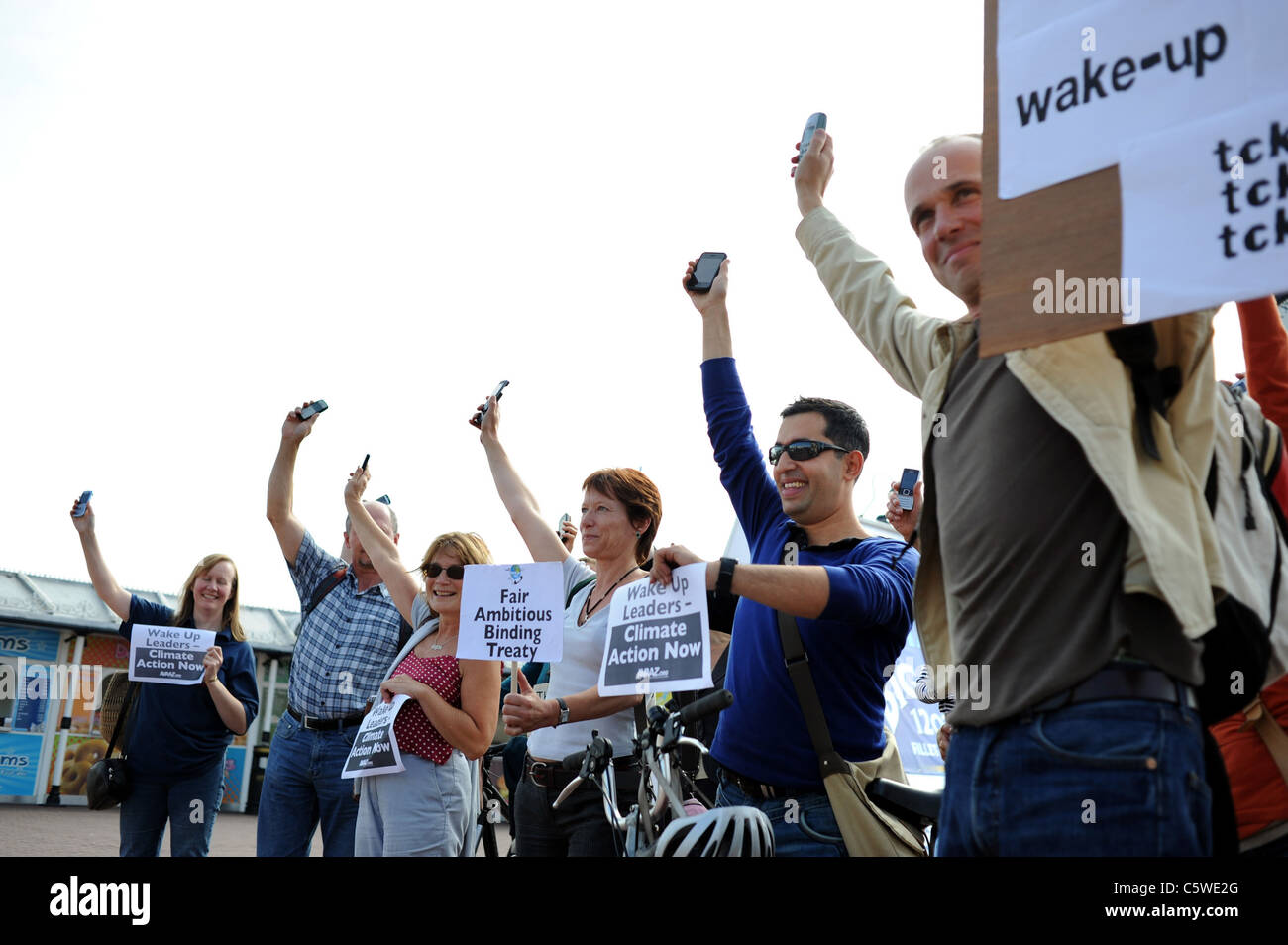 Climate protestors gather at the Palace Pier Brighton in a flash mob ...