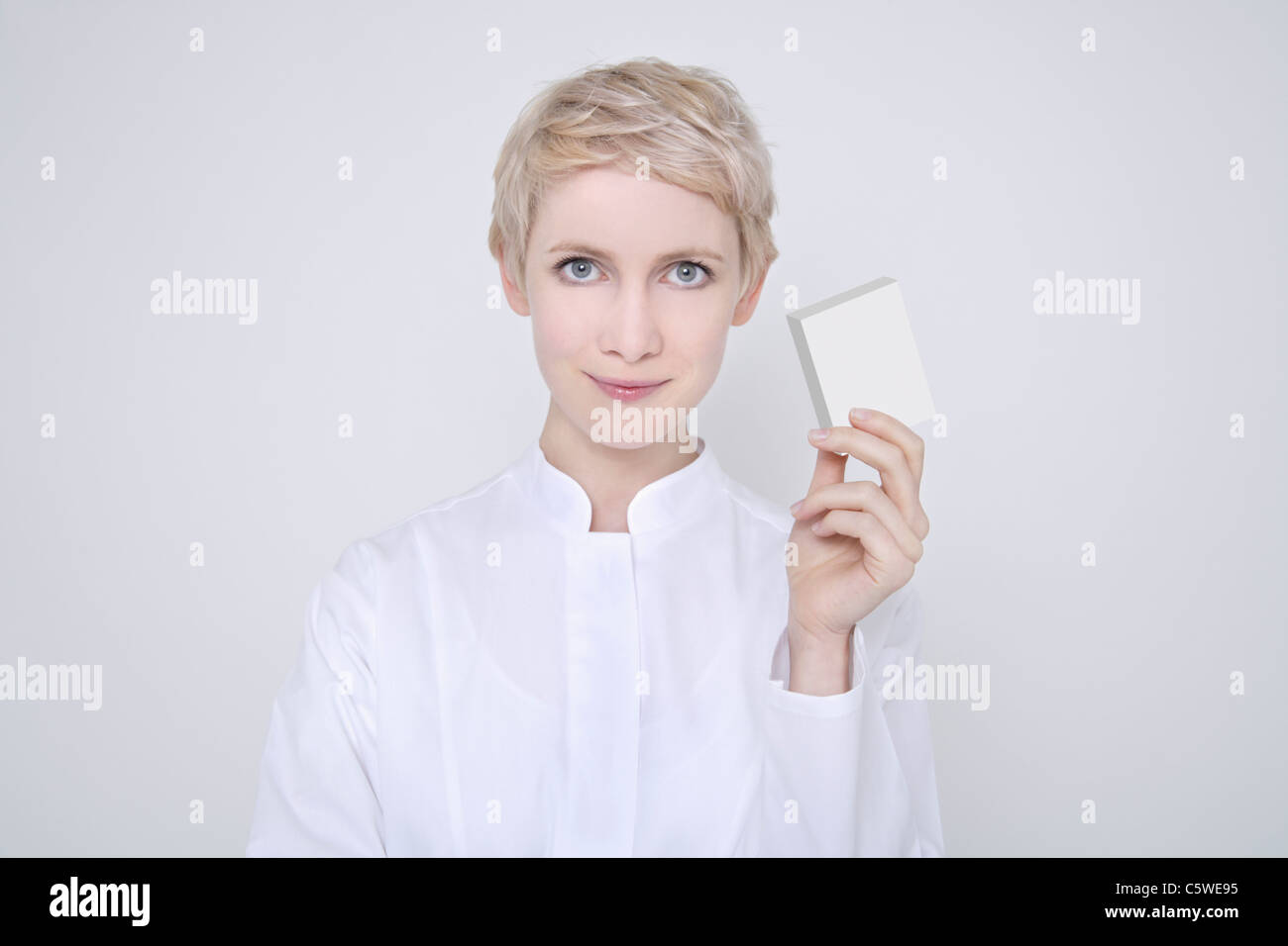Female Doctor holding medicine, portrait Stock Photo - Alamy