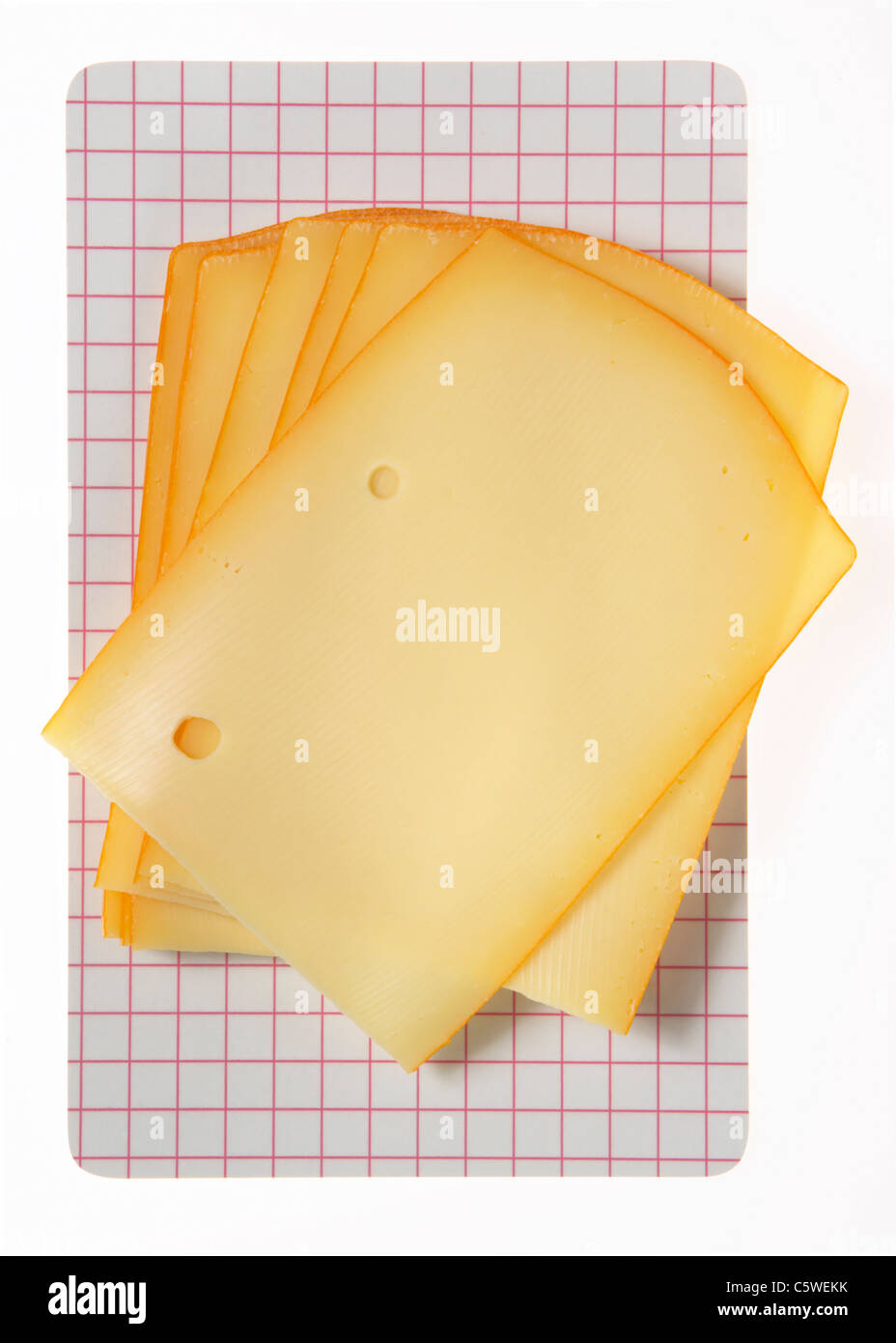 Gouda slices, elevated view Stock Photo - Alamy